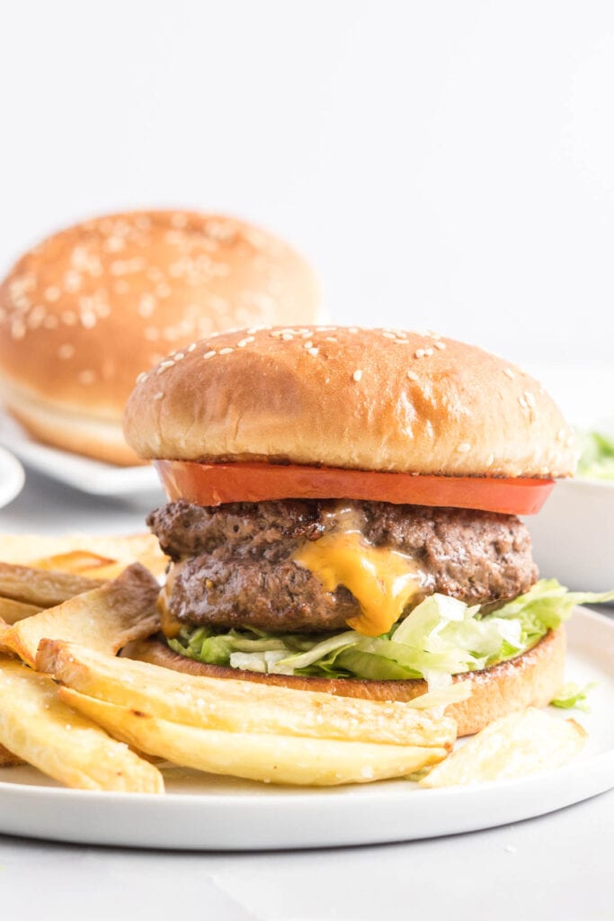 Juicy Lucy Stuffed Cheeseburgers - Tastes of Homemade