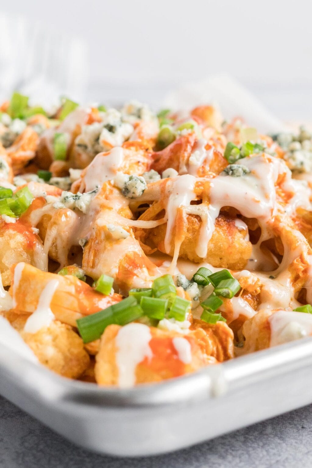 Buffalo Chicken Totchos (Tater Tot Nachos) - Tastes of Homemade