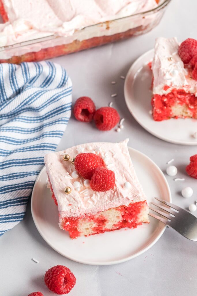 Raspberry Poke Cake - Tastes of Homemade