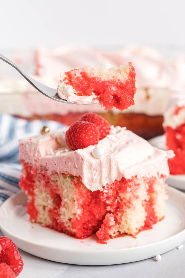 Raspberry Poke Cake - Tastes of Homemade