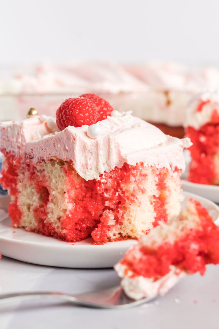 Raspberry Poke Cake - Tastes of Homemade