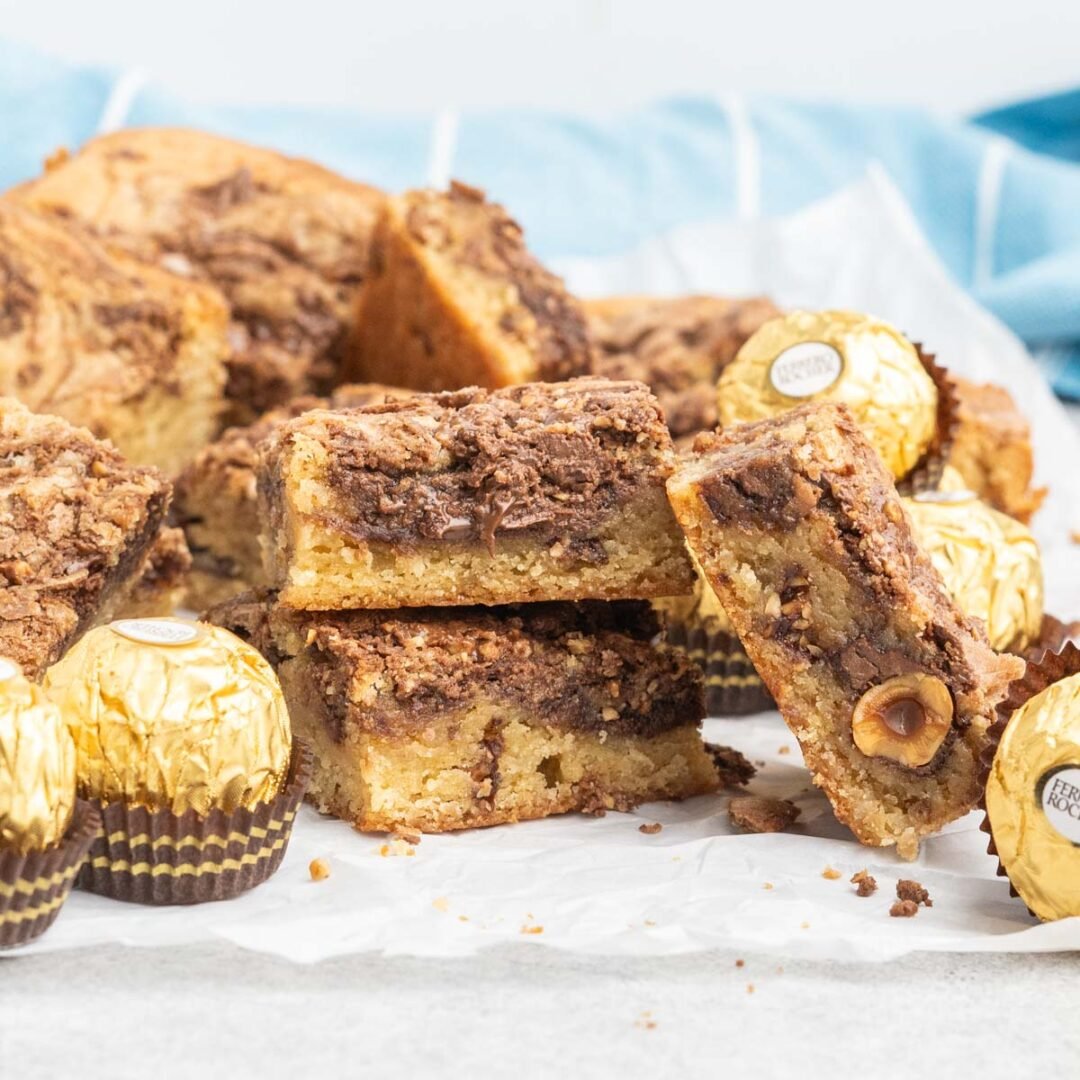 Ferrero Rocher Blondies (Ferrero Rocher Cookie Bars) - Tastes of Homemade